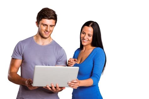 Pareja Joven Usando Una Computadora Portátil Foto Premium