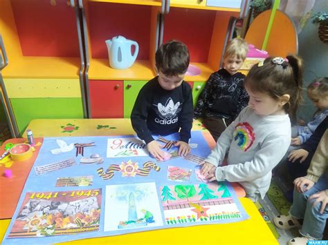 Коллективная работа по аппликации «Стенгазета к 9 Мая — Мы помним Мы гордимся с детьми