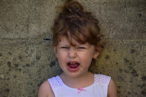 Premium Photo Portrait Of Girl Against Wall