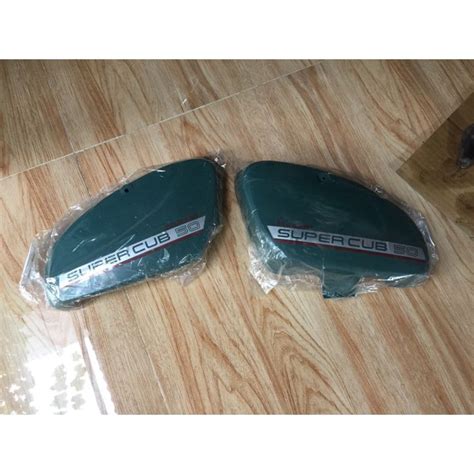 cặp nắp cốp hai bên honda cub cánh én đầu vênh bằng nhựamàu xanh đậu Lazada vn