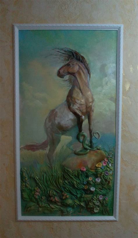 a painting of a horse is hanging on the wall