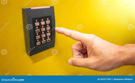 Male Finger Pressing Password Number On Digital Door Lock Stock Photo