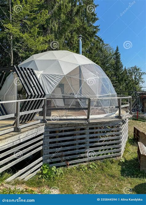 Modern Geodesic Dome Located In A Serene Forest Setting For Eco Friendly Living And Relaxation