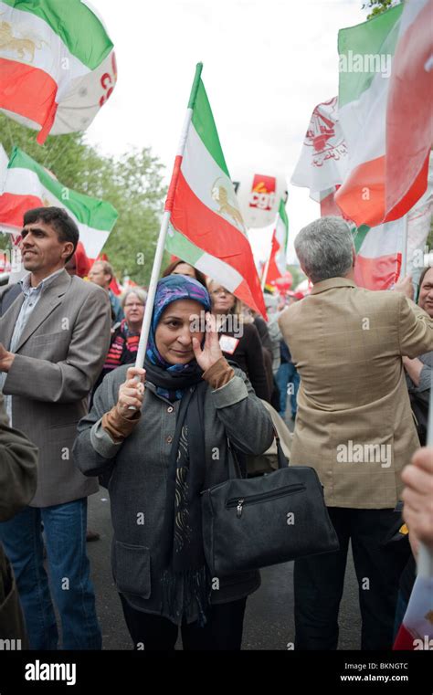 Iranians Muslim Woman Demonstrating Holding Flags In May 1 May Day