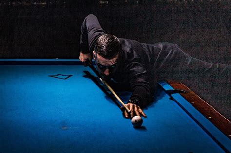 Premium Photo Man Playing With Ball On Table