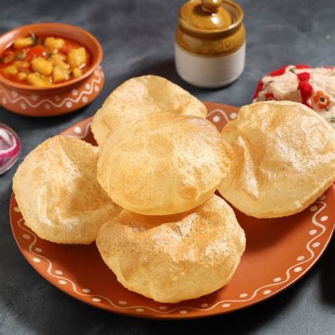 Poori Specialty Aroma Indian Cuisine