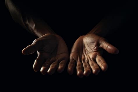 Premium Ai Image The Desperate Plea Begging Hands In The Dark