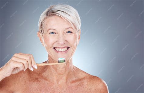 Premium Photo Smile Dental And Senior Woman Brushing Teeth For