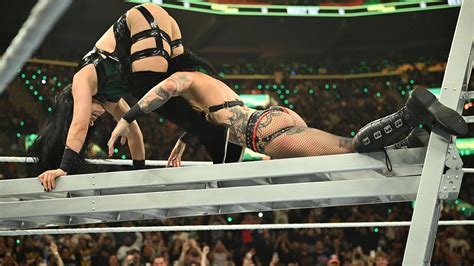 Stephanie Vaquer Hits A Devils Kiss On Rhea Ripley Onto A Ladder