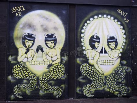 стена улицы надписи на стенах искусства цветастая покрытая Редакционное Фотография изображение