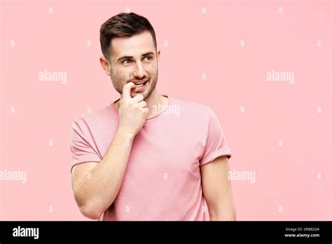 Funny Pensive Man Have Doubts Making Decision Looking To Copy Space On Pink Background Confuse