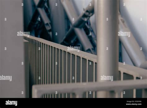 A Close Up Perspective Of An Architectural Design Showcases Intersecting Metal Beams And A Sleek