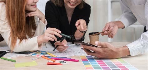 A Team Of Asian Designers Creates And Designs Ux Ui Brainstorming Software A Team Of Designers