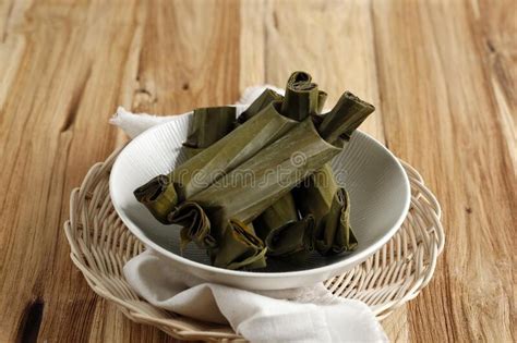 Lontong Is An Indonesian Dish Rice Is Rolled Inside A Banana Leaf And Boiled Then Cut Into