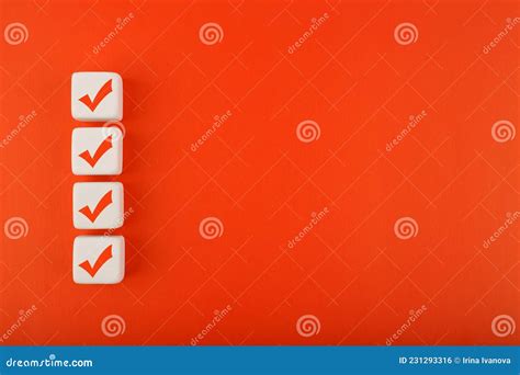 Four Red Checkmarks On White Cubes In A Row Against Red Background With