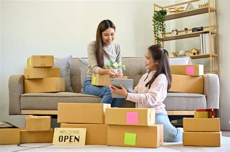 Asian Female Small E Commerce Business Owners Working Together In