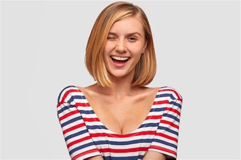 Free Photo Glad Attractive Young Woman With Bobbed Hairdo Has