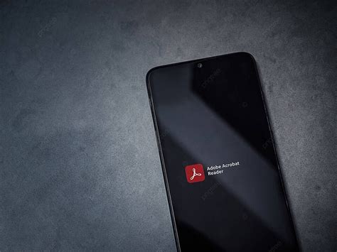 The Display Features The Launch Screen Of Adobe Acrobat Reader App With
