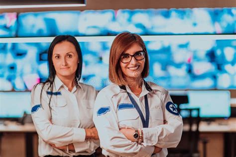 Group Portrait Of Female Security Operator While Working In A Data