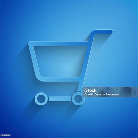 종이 컷 쇼핑 카트 아이콘 파란색 배경에 격리 온라인 구매 개념입니다 배달 서비스 기호입니다 슈퍼마켓 바구니 기호입니다 종이