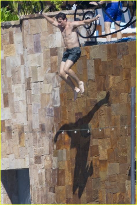Miles Teller Goes Shirtless Bares Ripped Physique During Vacation In