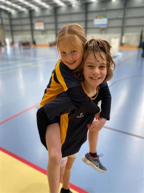 Aspiring Netball Players Pivot Pass Dodge And Defend On The Court T