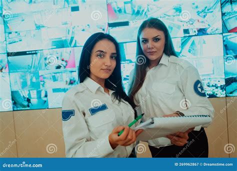 Group Portrait Of Female Security Operator While Working In A Data