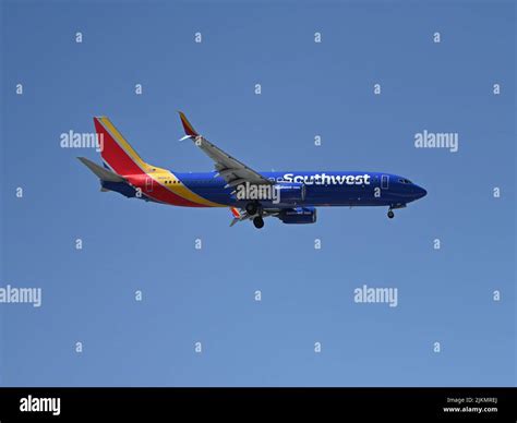 A Southwest Airlines Boeing 737 In Flight With A Background Of Blue Sky