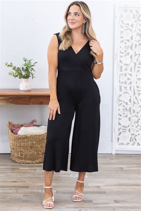 Black Surplice Neckline Sleeveless Jumpsuit · Filly Flair