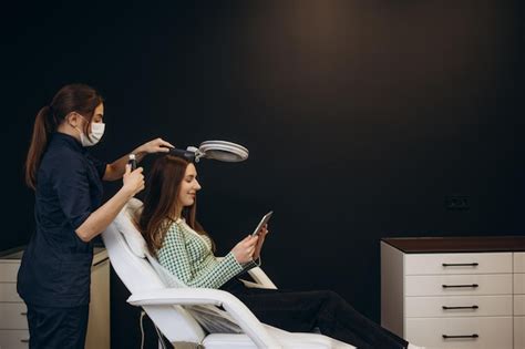 Premium Photo Doctor Trichologist Examines Woman Patient S Hairs