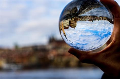 Premium Photo Close Up Of Human Hand Holding Crystal Ball