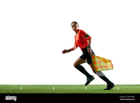 Assistant Referee Young Woman In Uniform In Motion On Field Running