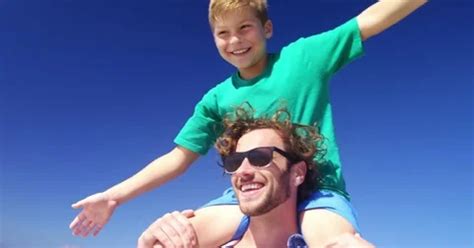Father Carrying Son On His Shoulders At Stock Video Pond