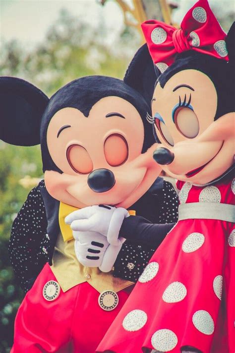 Mickey Happily Kisses Minnie S Hand While Performing In The Dream Along