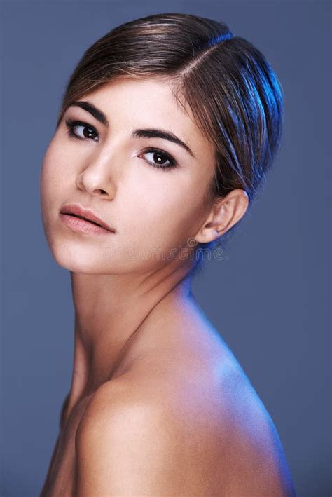 Luminous Beauty A Cropped Portrait Of A Beautiful Young Woman Isolated