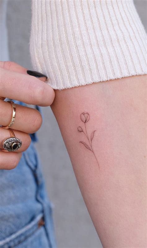 30 Beautiful Flower Tattoo Ideas A Knotted Pair Of Ginkgos Best