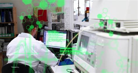 image of data processing against rear view of male scientist using
