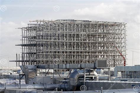 View Of Asrs Clad Rack Structure Warehouse Towering Over Neighbouring