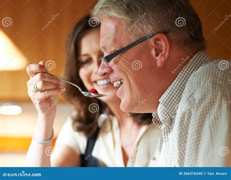 Take A Bite Honey Middle Aged Wife Playfully Feeding Her Husband