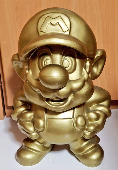 タンジェント Mario Collector On Twitter 任天堂エンターテイメントの加盟店の金のマリオ像、7年前に運良く