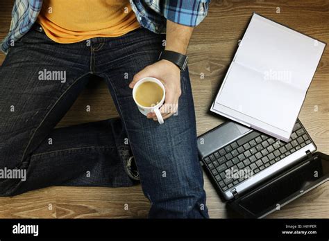 Man On The Floor With A Laptop Stock Photo Alamy