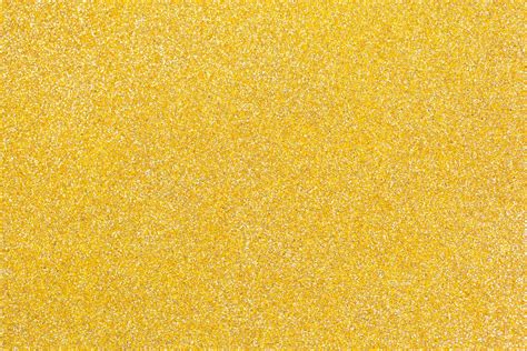 Download A Dazzling Array Of Yellow Glitter Wallpaper