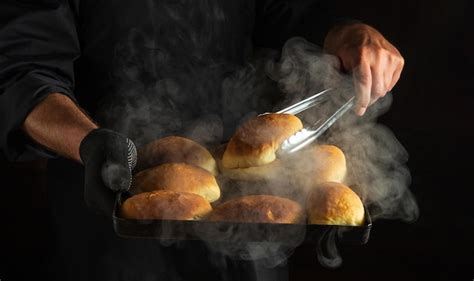 Premium Photo Only Oven Baked Buns On A Hot Baking Sheet In The Baker