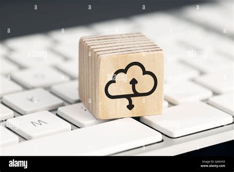 Cloud Computing Icon On Wooden Block On Computer Keyboard Stock Photo