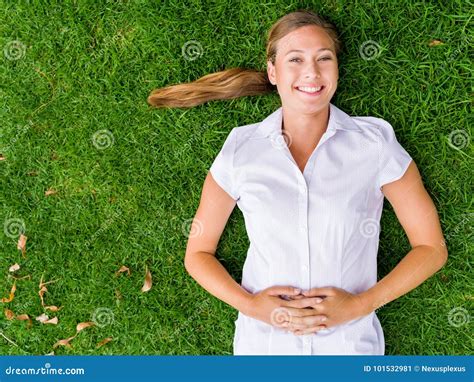 Pretty Young Woman Relaxing On A Grass Stock Image Image Of Freedom