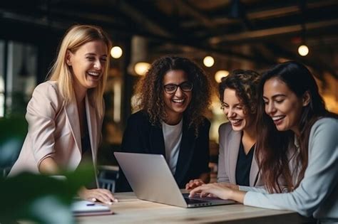 Premium Ai Image Generative Ai Joy Of Teamwork Female Coworkers Using