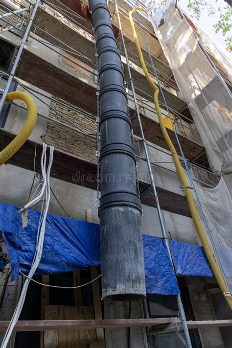 Scaffolding On The Facade Of A Multi Story Building Reconstruction Of