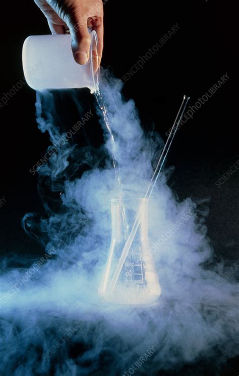 Liquid Nitrogen Being Poured Into Flask Stock Image A5000123
