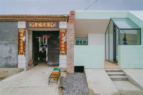 Green Ceramic Tiles Cover Extension Of A House In Rural China