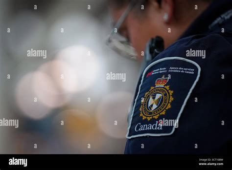 A Canada Border Services Agency Patch Is Seen On The Uniform Of A Cbsa Employee At Vancouver
